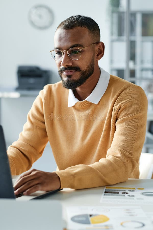 Mixed Race Businessman at Work Stock Photo - Image of business, table ...