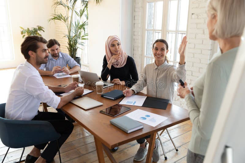 Mixed-race Female Seminar Participant Raise Hand Having Question Stock ...