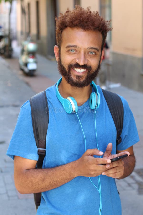 Mixed Race Guy Smiling Outdoors Stock Image - Image of modern, mobile ...