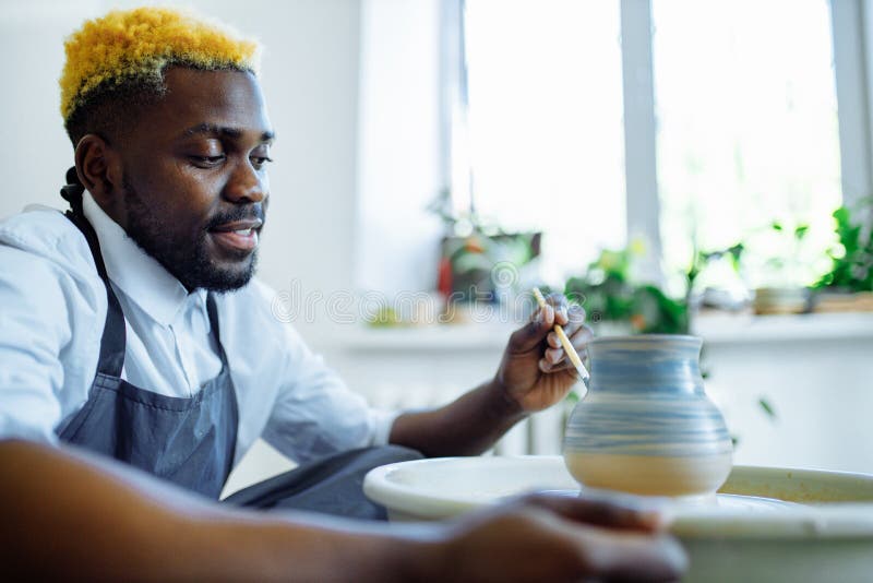 Mixed Race Man Making a Vase in Pottery Studio Stock Image - Image of ...