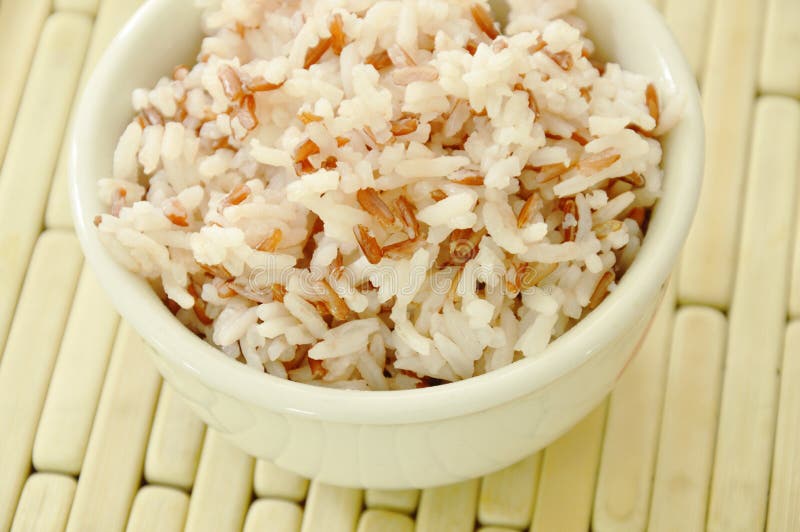Mixed Red Cargo Rice in Cup and Spoon on Bamboo Plate Stock Image ...