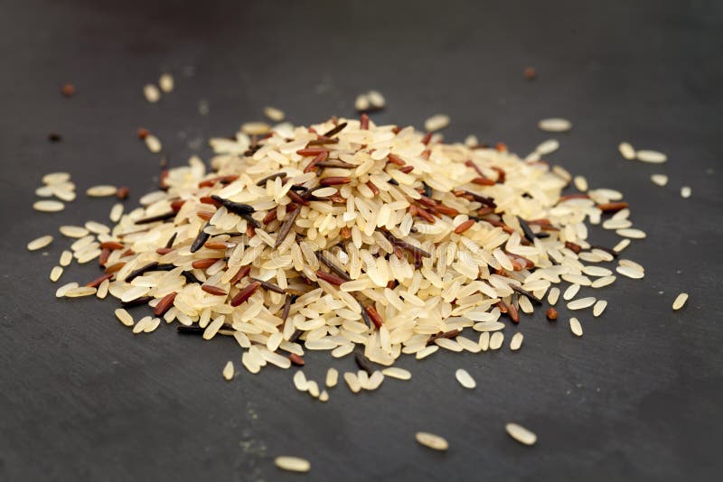 Mixed rice on black slate stock photo. Image of black - 88688336