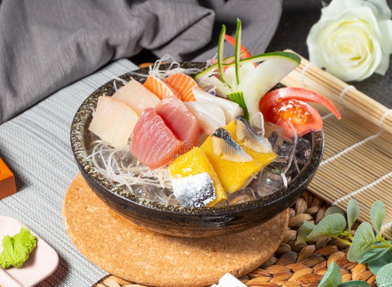 Mixed Sashimi on Ice Cubes Served in Dish Isolated on Table Top View of ...