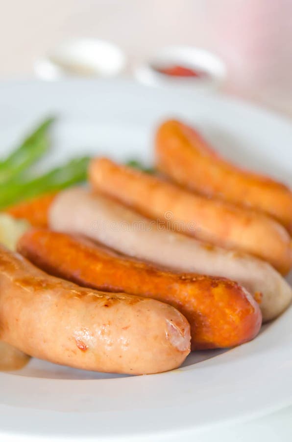 Mixed sausage on dish stock photo. Image of white, lunch - 57590174