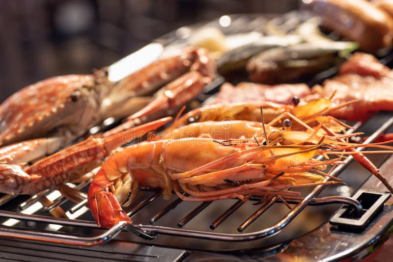Mixed Seafood on the Flaming Grill Stock Photo - Image of cooked ...