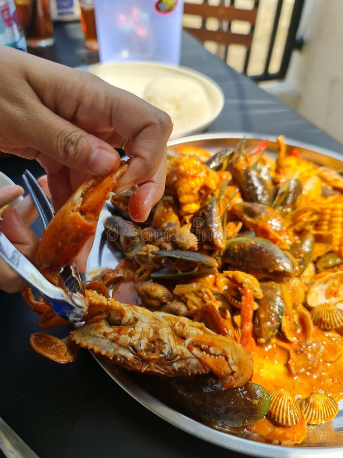 Mixed Seafood Oyster, Lobster and Crab with Chilli Sauce Stock Image ...