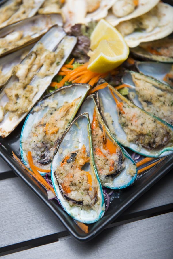 Mixed Shell Bake for Dinner Stock Photo - Image of dish, black: 59535766