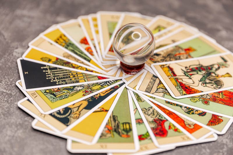 Mixed Tarot Cards on the Table with a Magic Ball. Stock Image - Image ...