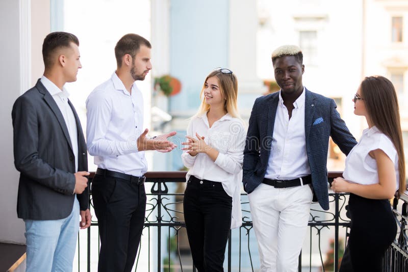 Mixed Team of Business People Discussing Their Ideas in Office Stock ...