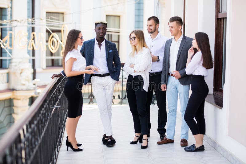 Mixed Team of Business People Discussing Their Ideas in Office Stock ...
