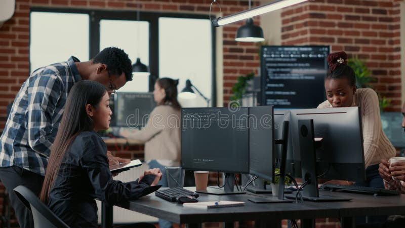 Mixed Team Of Software Developers Analyzing Source Code Pointing At Screens Comparing Algorithm 9266