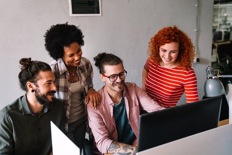Mixed Team of Software Engineers Brainstorming Ideas. Diverse App Developers Collaborating As ...