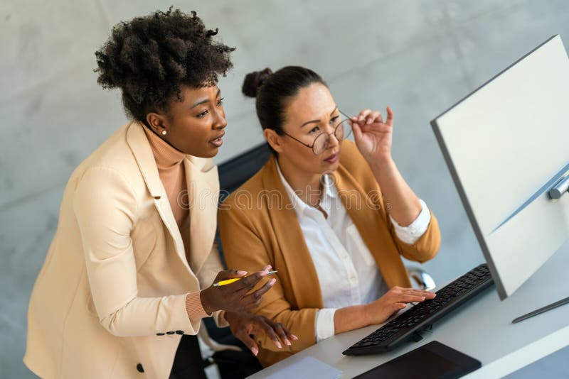 Mixed Team of Software Engineers Brainstorming Ideas. Diverse App Developers Collaborating As ...