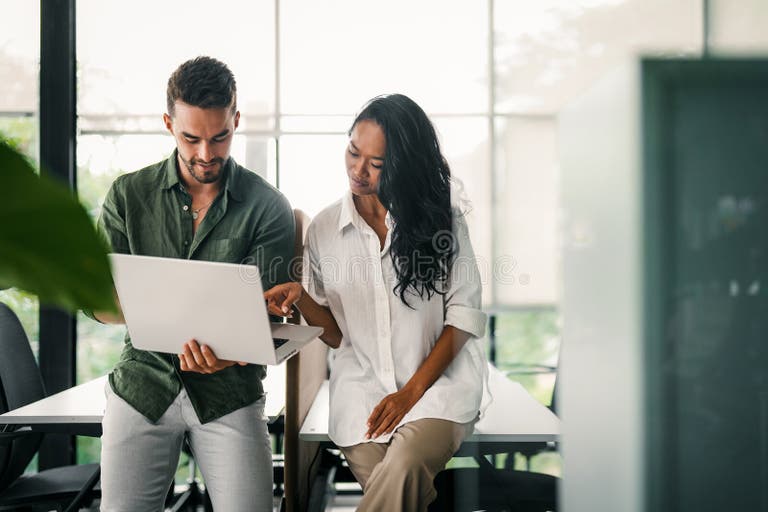 Mixed Team of Software Engineers Brainstorming Ideas. Diverse App Developers Collaborating As ...