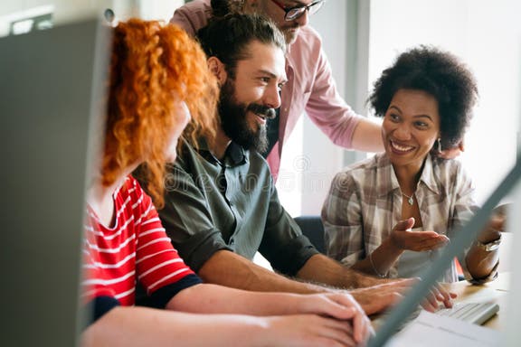 Mixed Team of Software Engineers Brainstorming Ideas. Diverse App Developers Collaborating As ...
