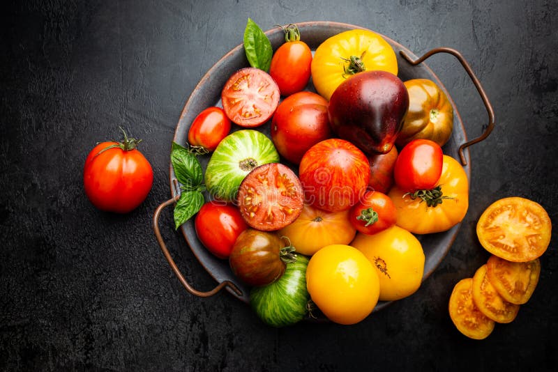 Mixed tomatoes top view. stock photo. Image of agriculture - 223988894