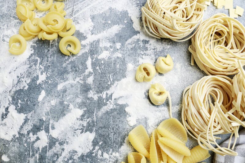 Mixed Types and Shapes of Italian Pasta on Grey Stone, Background Stock ...