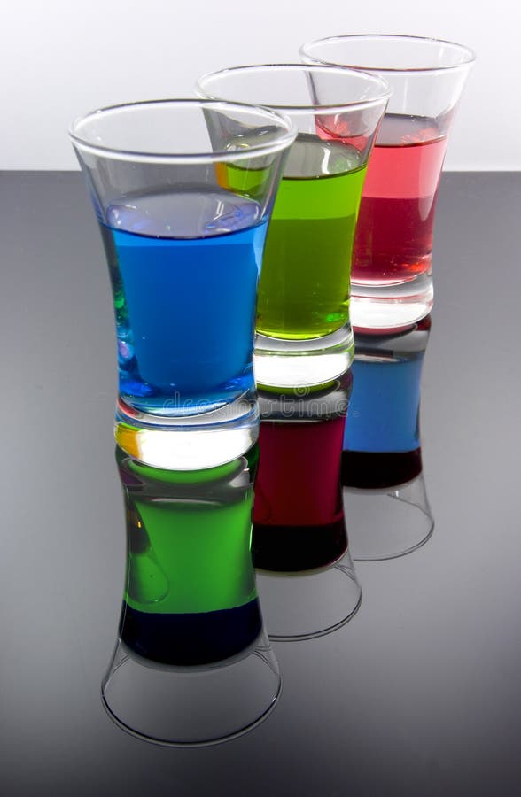 Colorful Shot Glasses stock image. Image of alcohol, blue - 7304615