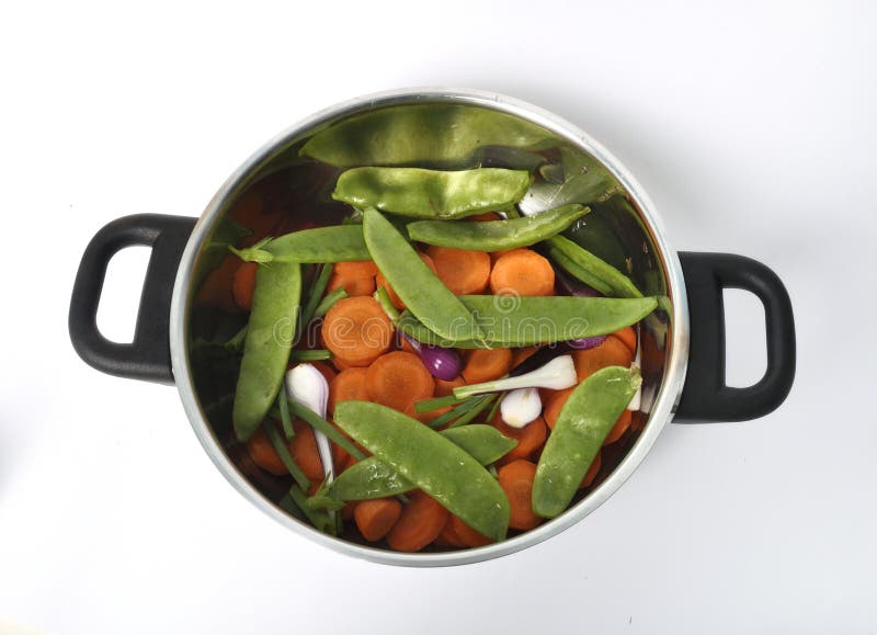 Mixed vegetables in a pot stock image. Image of light - 228948591