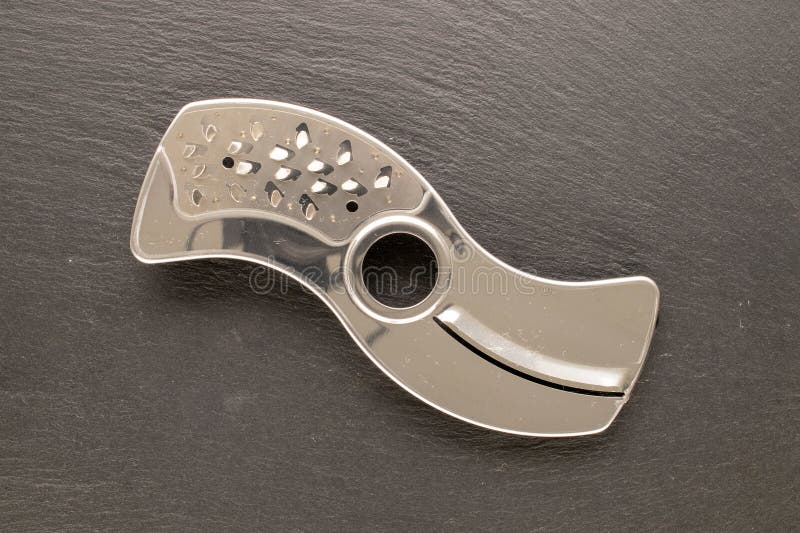 One Metal Mixer Knife on Slate Stone, Macro, Top View. Stock Photo ...