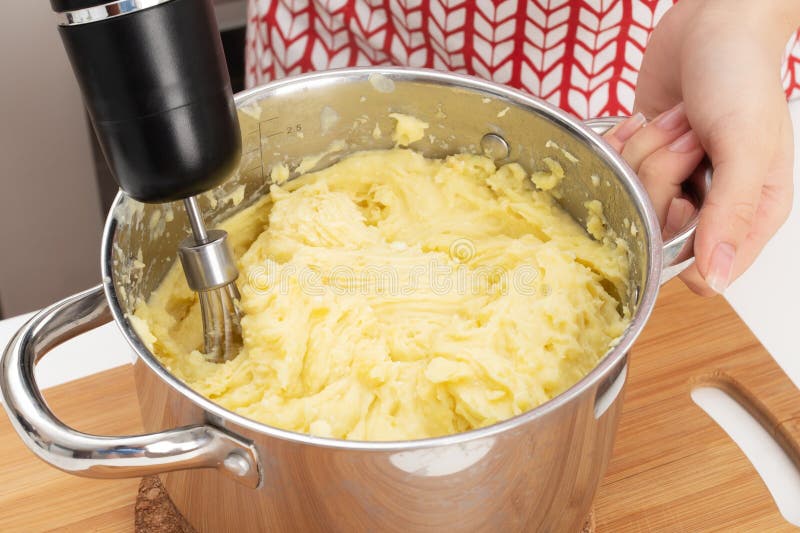 Mixer Stirs Mashed Potatoes Stock Photo - Image of gourmet, female ...