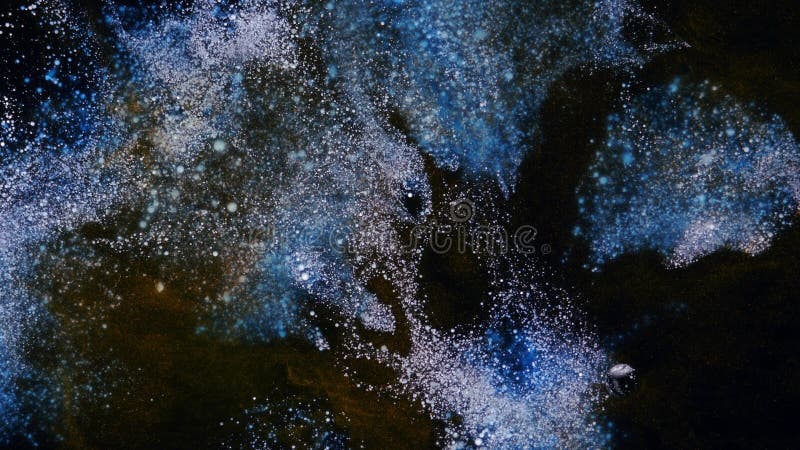 Mixing of Blue and Gold Colors on a Black Three-dimensional Moving ...