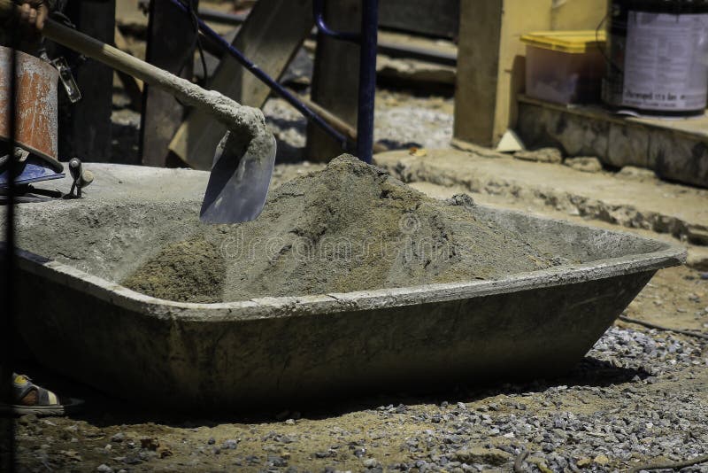 Mixing concrete with sand stock image. Image of build - 89685957