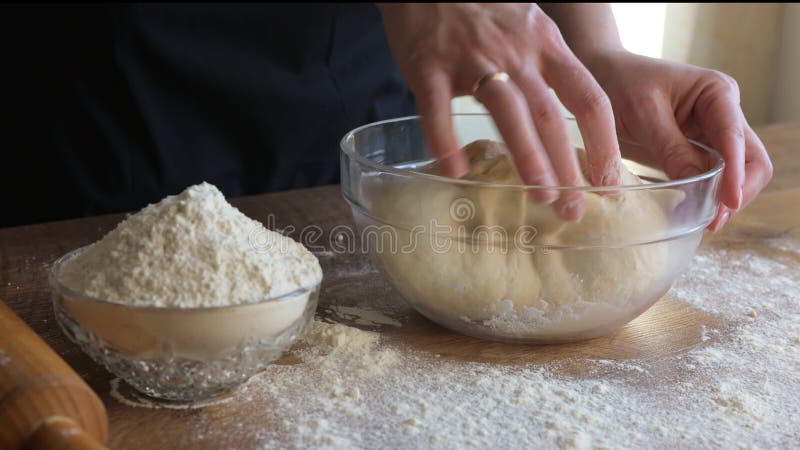 Mixing Dough for Baking. a Woman S Hand Kneading Dough. Stock Video ...