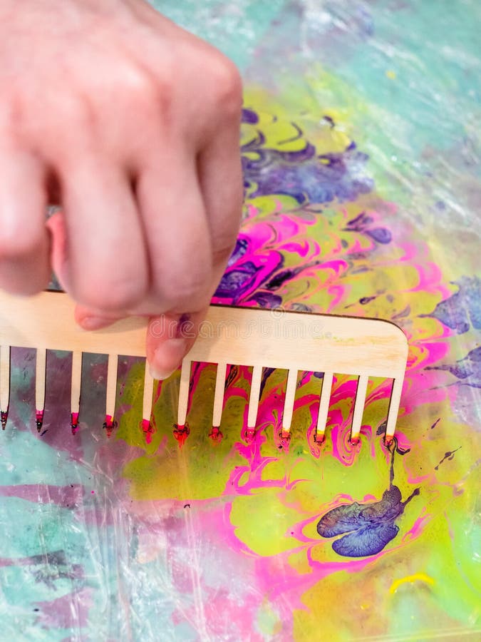 Comb for Marbling and Wet Paper on Spotted Surface Stock Image - Image ...