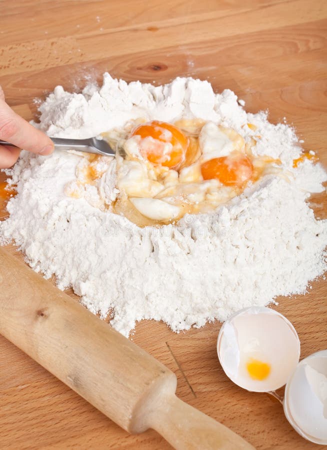 Mixing Eggs into the Pastry Stock Image - Image of hand, center: 39153749