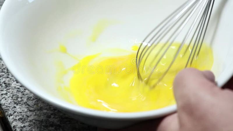 Action of Stirring or Mixing Eggs for Cooking Stock Video - Video of ...