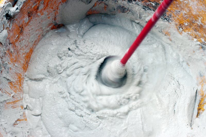 Mixing glue or cement stock photo. Image of cement, mixer - 25002892