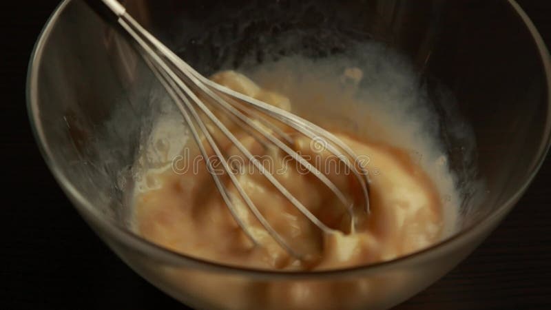 Mixing Liquid Ingredients for Pancakes with a Whisk. Top View of the ...