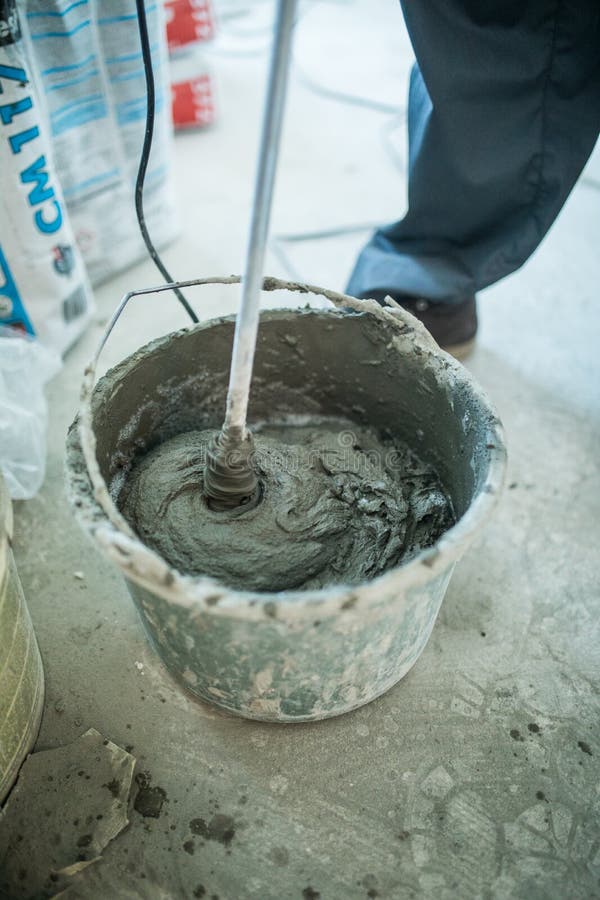 Mixing of a Plaster Solution by an Electric Drill. Home Renovation ...