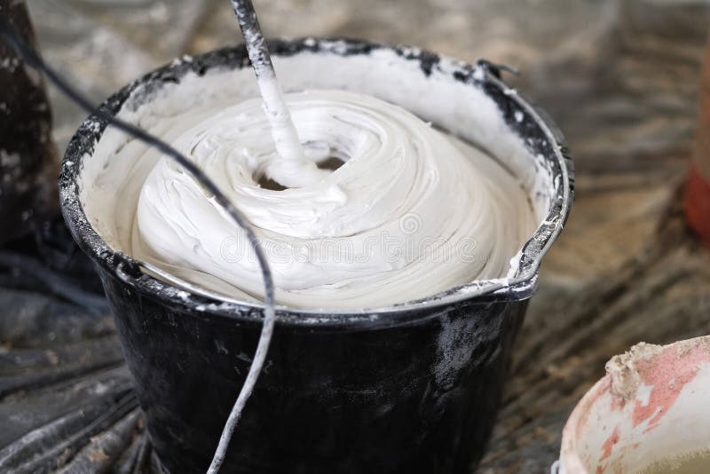 Plaster is Mixed in a Bucket Stock Photo - Image of cement, craft ...