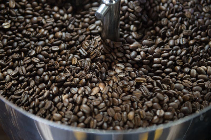 Mixing roasted coffee stock image. Image of production - 107895259