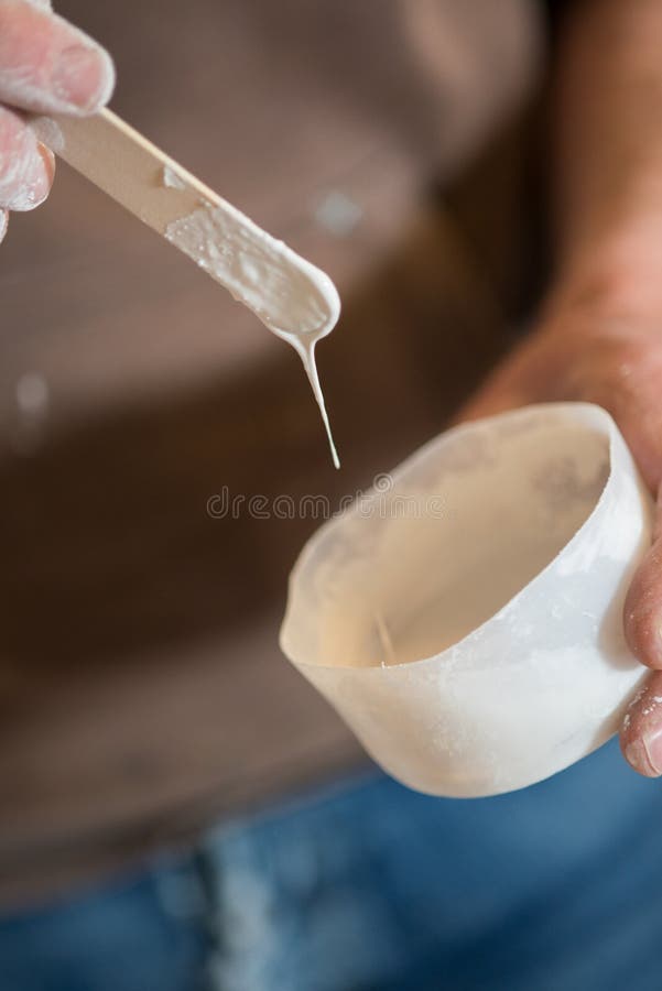 Mixing White Paint in Small Container Stock Photo - Image of stain ...