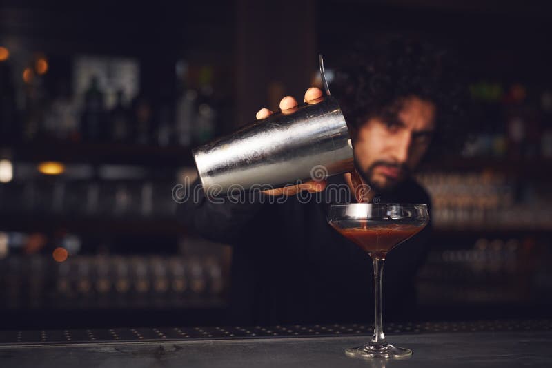 Mixologist Pouring Cocktail in Bar Stock Image - Image of pouring ...
