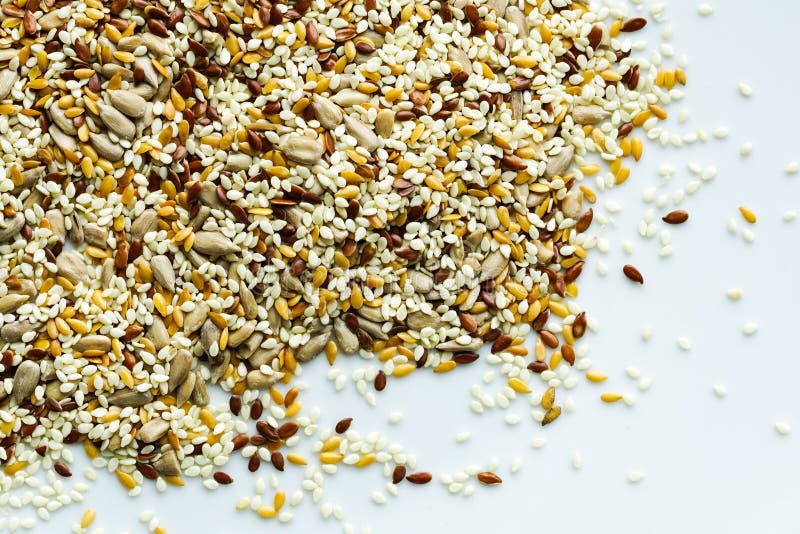 A Mixture of Different Seeds on a White Background Stock Photo - Image ...