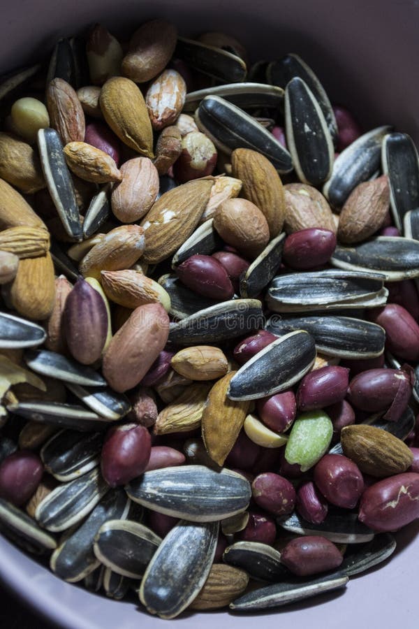A Mixture of Different Types of Nuts and Seeds. Ground Nuts, Almonds ...