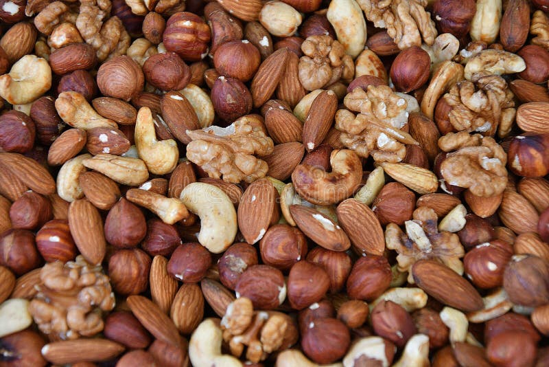 A mixture of dried nuts stock photo. Image of season - 97825964