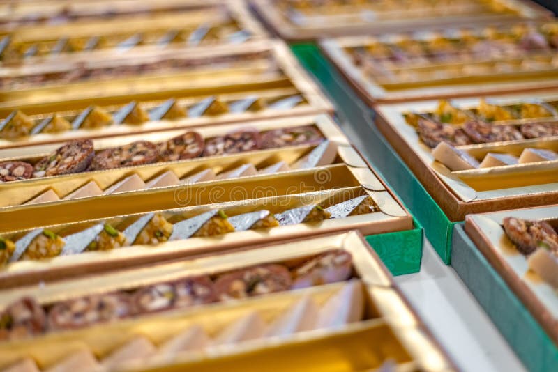 A Mixture of Various Indian Sweets Packed in a Box. Peda, Laddu, Mithai ...