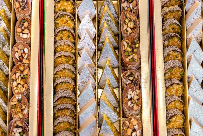 A Mixture of Various Indian Sweets Packed in a Box. Peda, Laddu, Mithai ...