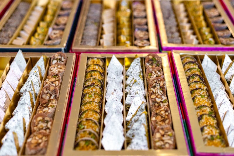 A Mixture of Various Indian Sweets Packed in a Box. Peda, Laddu, Mithai ...