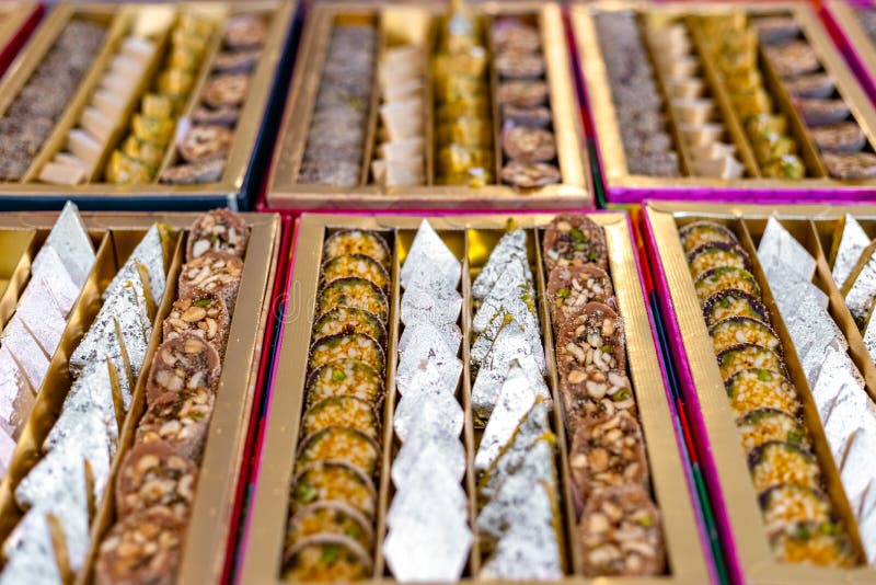 A Mixture of Various Indian Sweets Packed in a Box. Peda, Laddu, Mithai ...