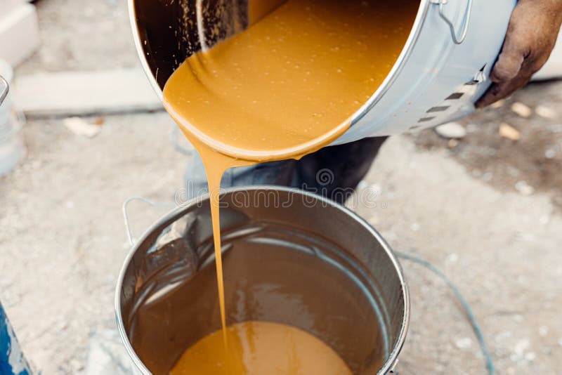 Mixture of Yellow Color with Epoxy Resin for Industrial Floors Stock ... Mixture of Yellow Color with Epoxy Resin for Industrial Floors Stock ...