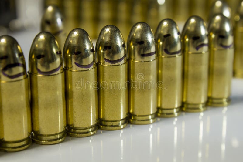 9mm bullets on a table stock image. Image of symbol - 263269317