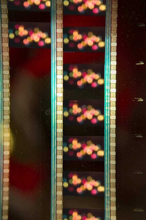 35 mm film stock image. Image of perforated, glow, strip - 99118053