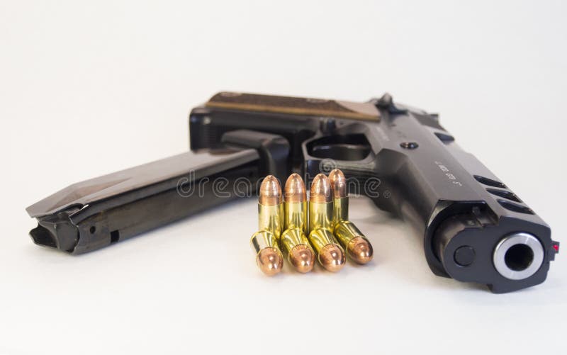 9mm Gun with Bullets and a Magazine. Stock Image - Image of white ...