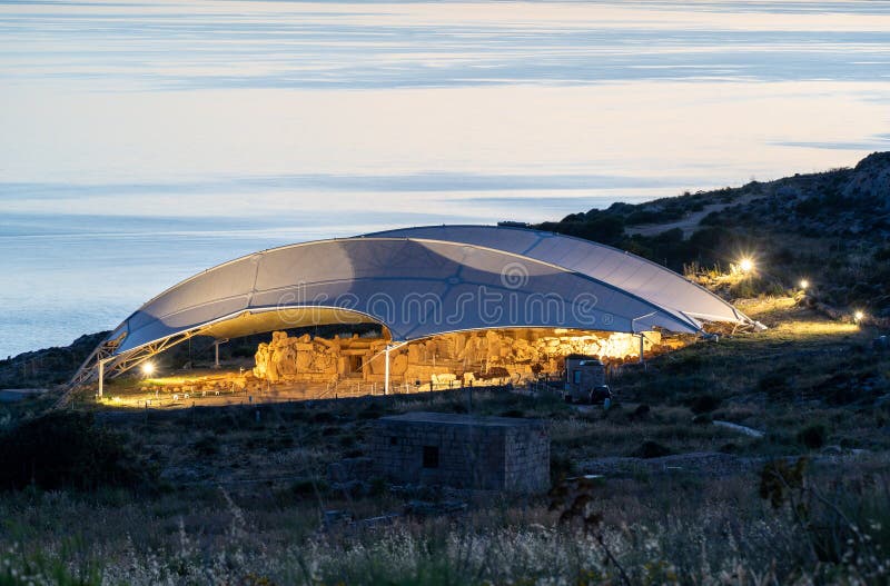 Mnajdra Temple Illuminated at Dusk by the Mediterranean Coast Stock ...